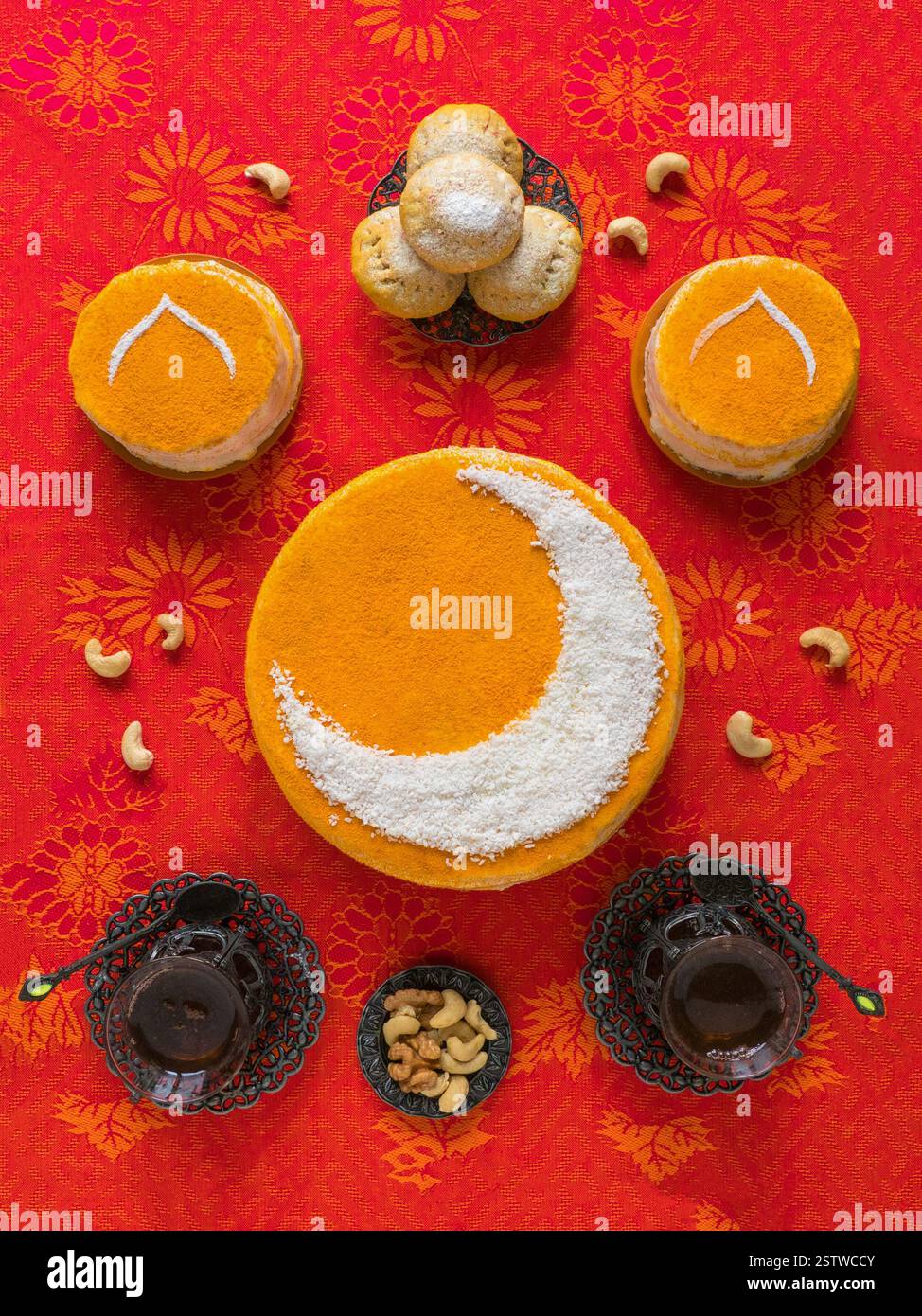 Homemade golden cake with a Crescent moon, served with tea cup and ...