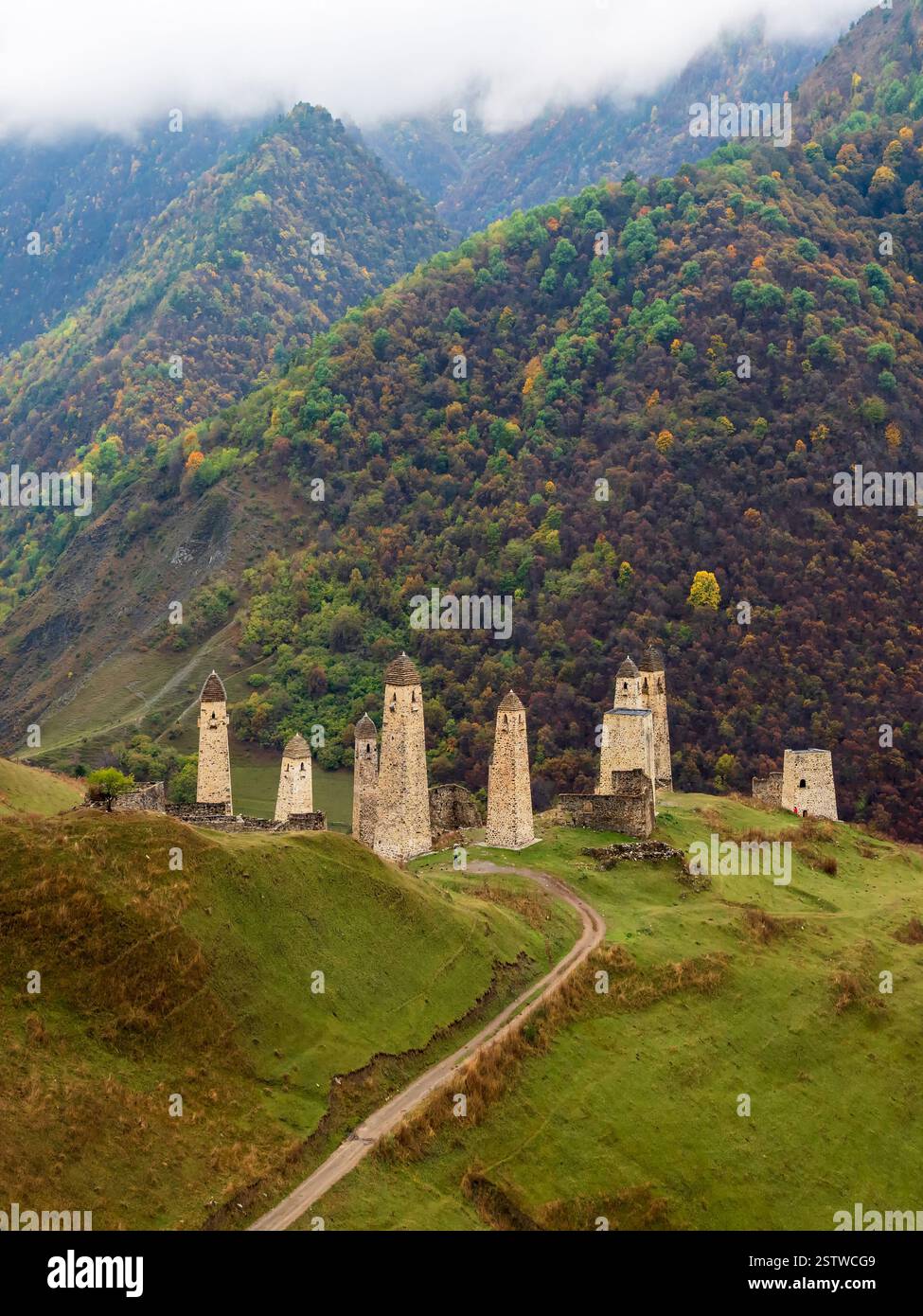 Dirt road to the tourist tower complex. Majestic battle towers o Stock ...