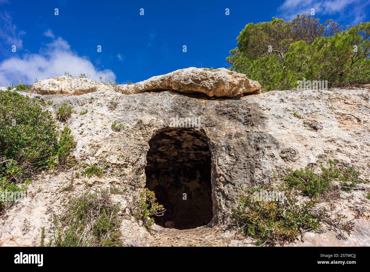 Cala Bota cave Stock Photo - Alamy