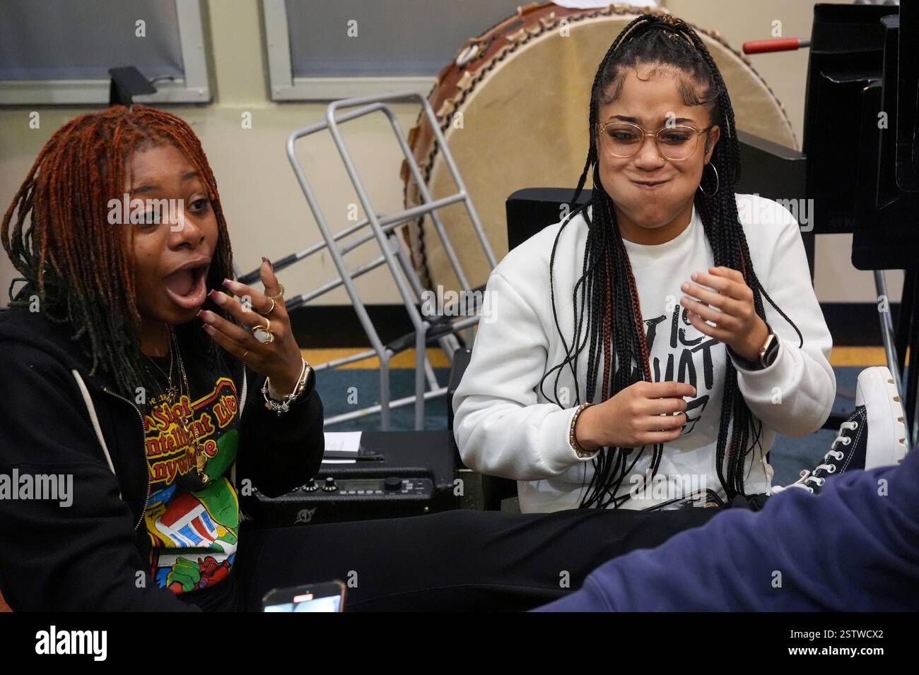 Pasley Thompson, left, and Tatiyana Clark, joke around before rehearsal ...