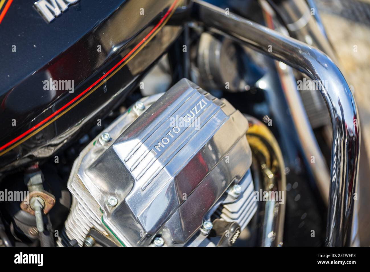 The engine of Moto Guzzi motorcycle, close-up. Art lens. Swirl bokeh ...