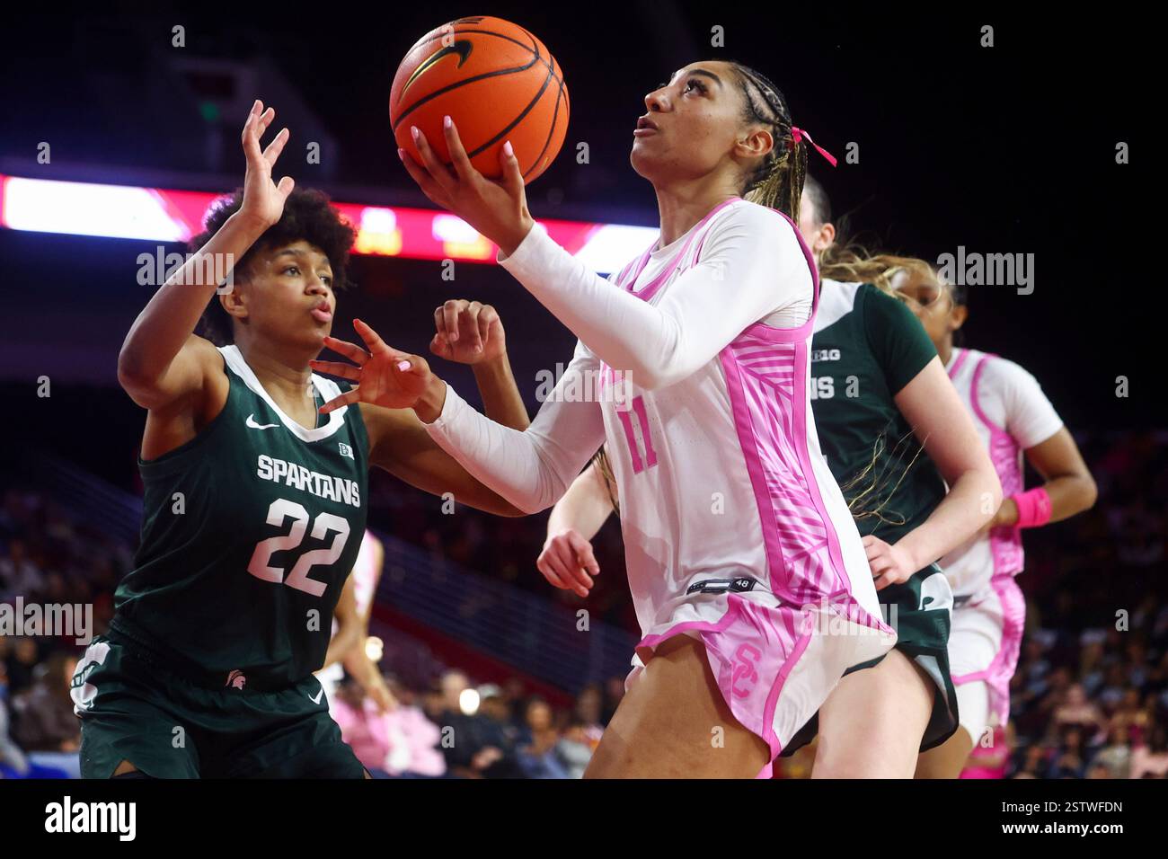 Southern California guard Kennedy Smith (11) drives to the basket ...