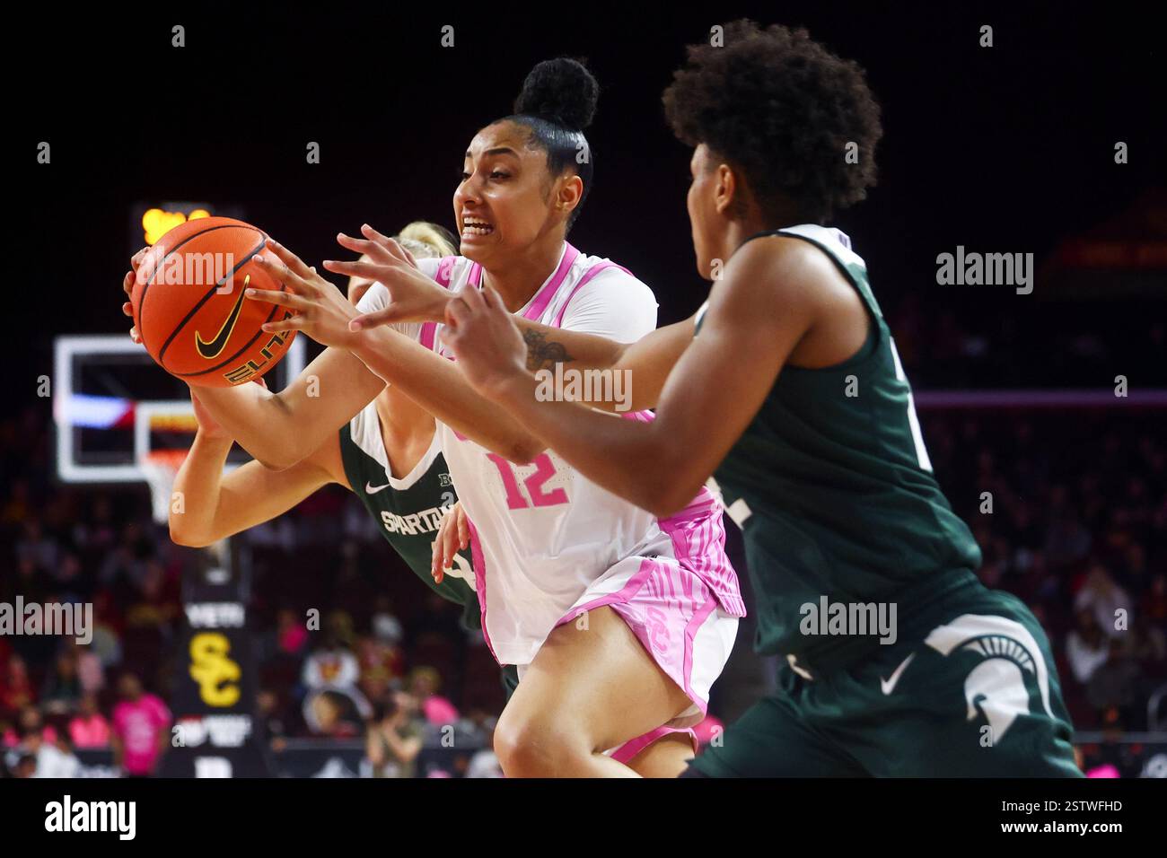 Southern California guard JuJu Watkins (12) drives to the basket ...