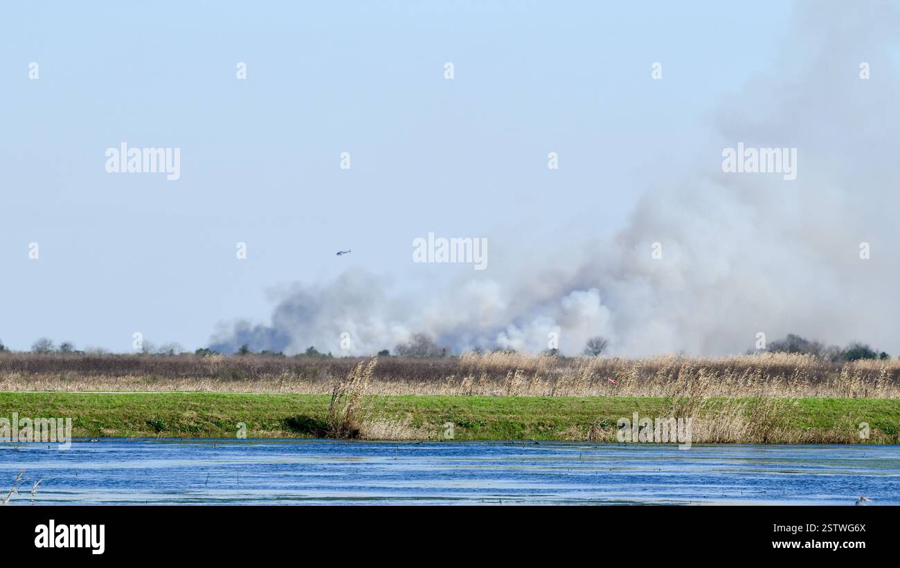 Middleton wildfire near Stowell in Texas as seen from Anahuac NWR Stock ...