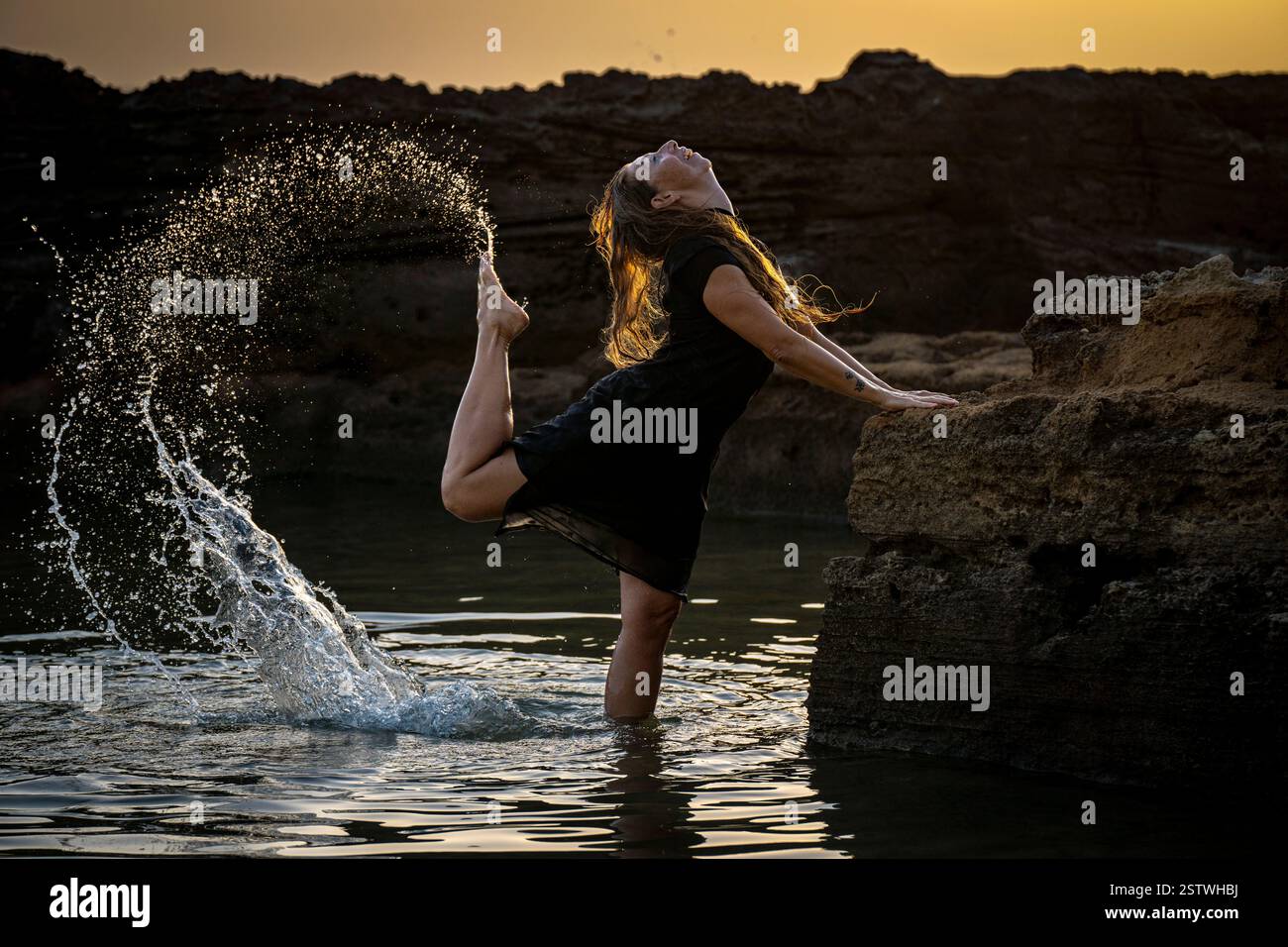 Young woman dancing in joy hi-res stock photography and images - Alamy
