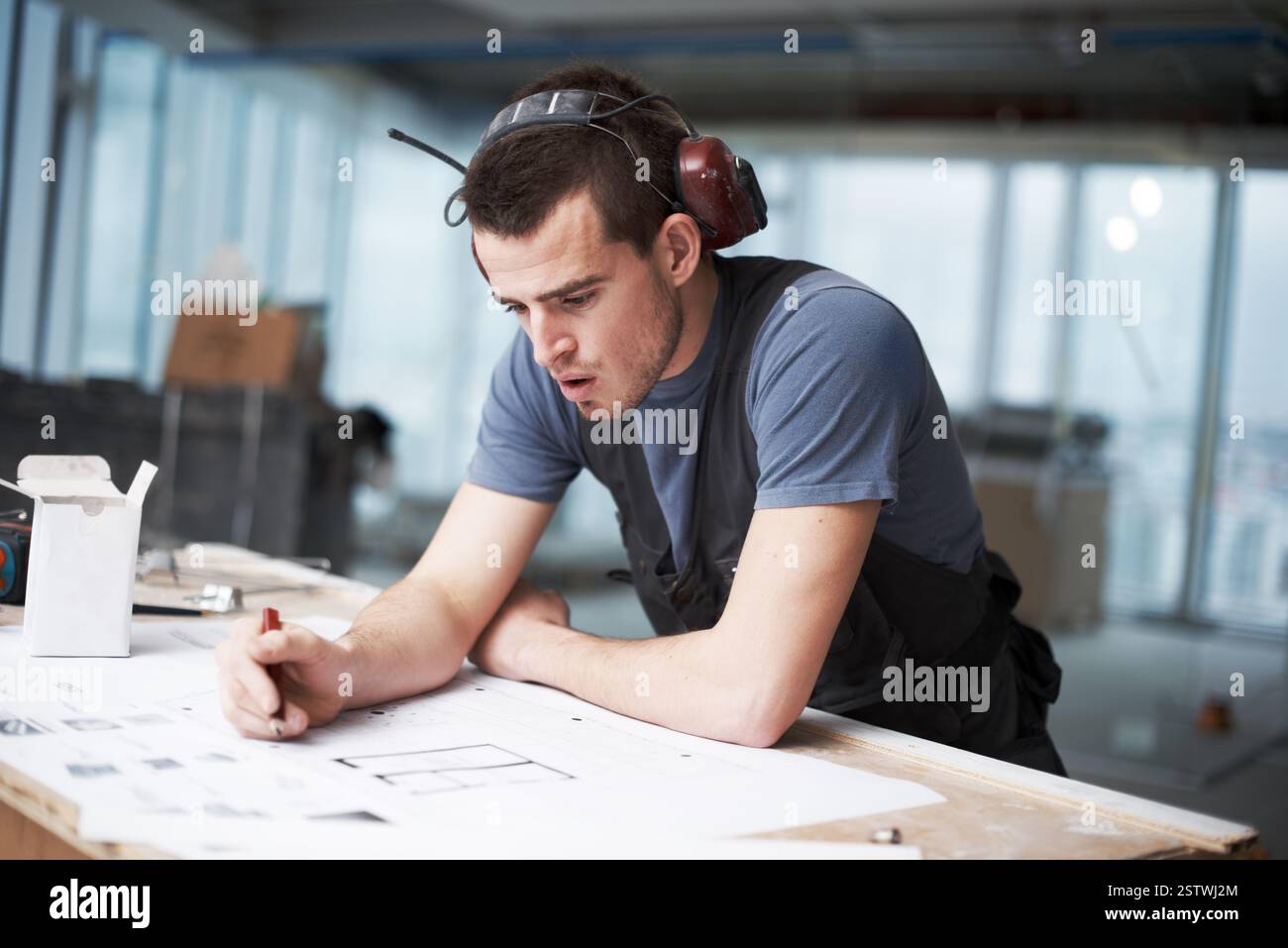 Man, blueprint and architect with construction site, floor plan and ...