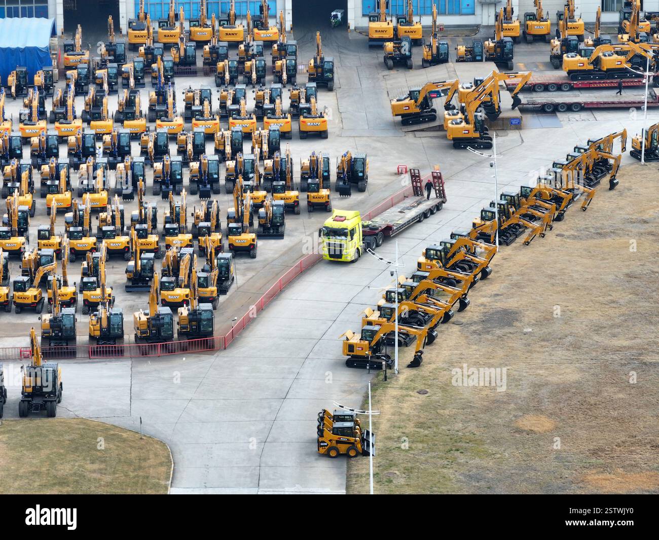 KUNSHAN, CHINA - FEBRUARY 20, 2025 - Construction machinery vehicles ...
