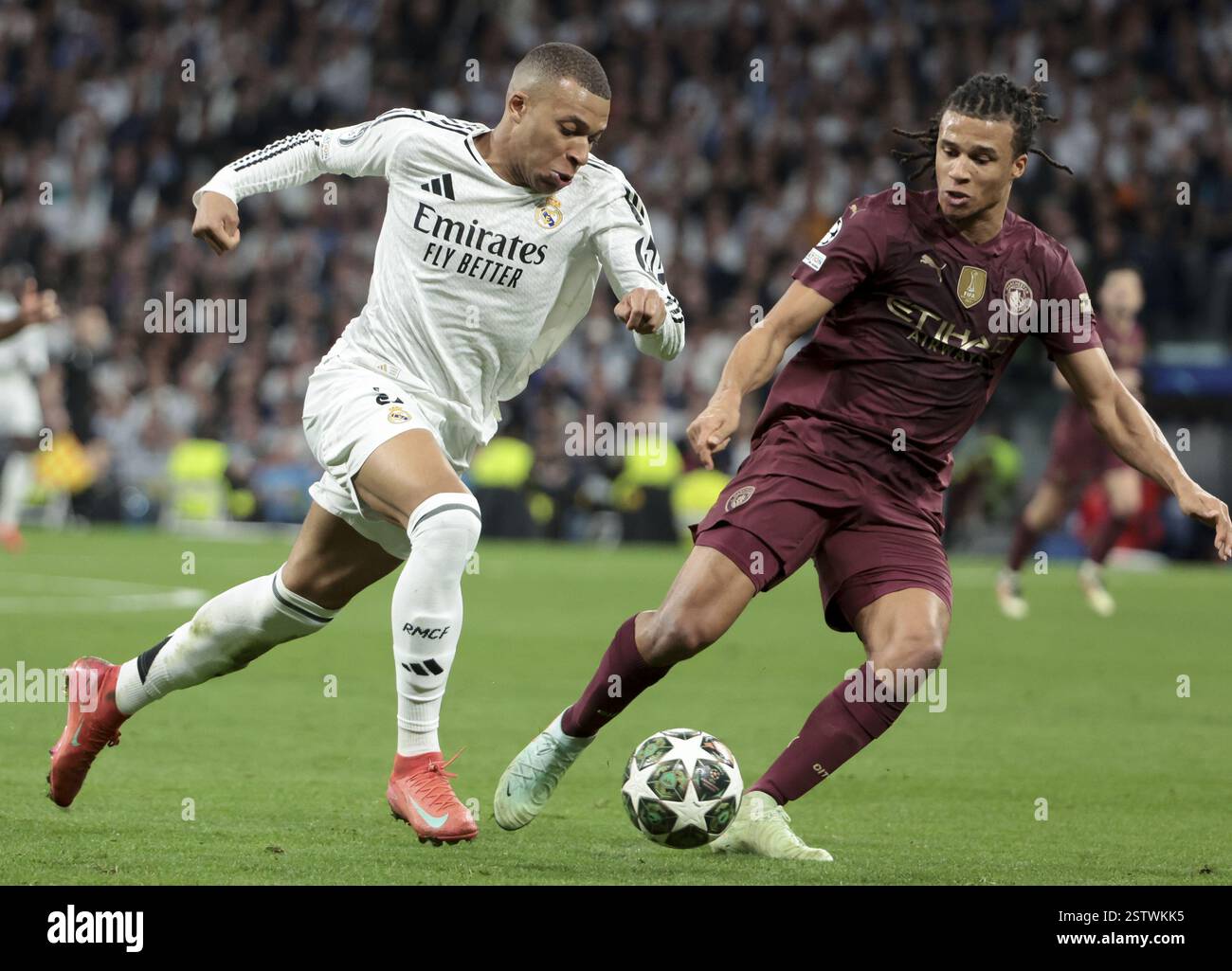 Kylian Mbappe of Real Madrid, Nathan Ake of Manchester City during the UEFA Champions League ...