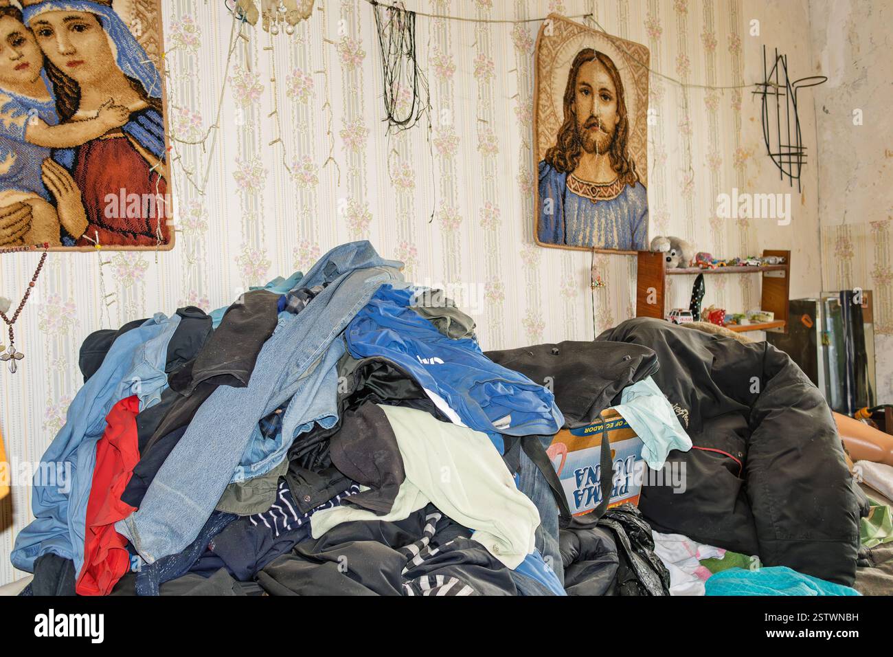 Ukraine, Romny, October 21, 2024: A chaotic and unkempt room filled ...