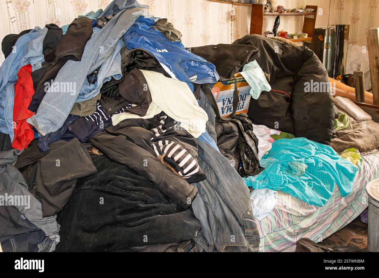 Ukraine, Romny, October 21, 2024: A chaotic and unkempt room filled ...