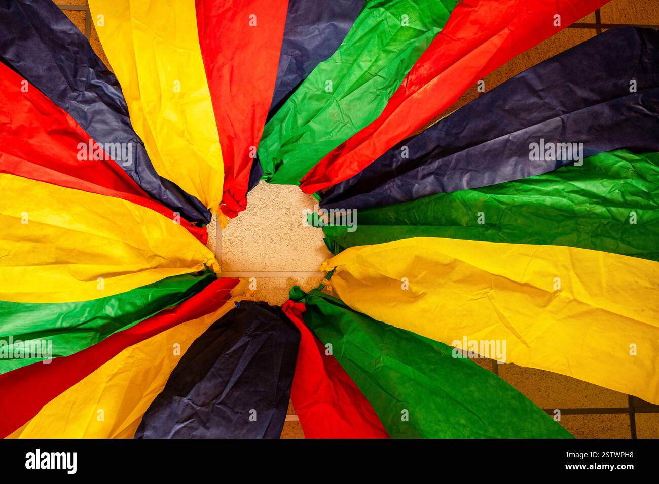 Ceiling decorated with strips of colored paper Stock Photo - Alamy