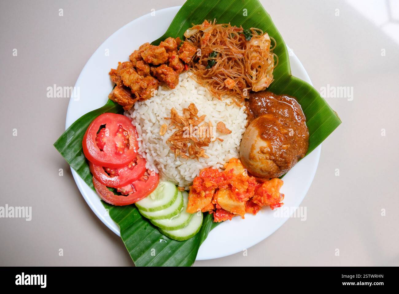 Indonesian traditional food, nasi uduk is a coconut-flavored steamed ...
