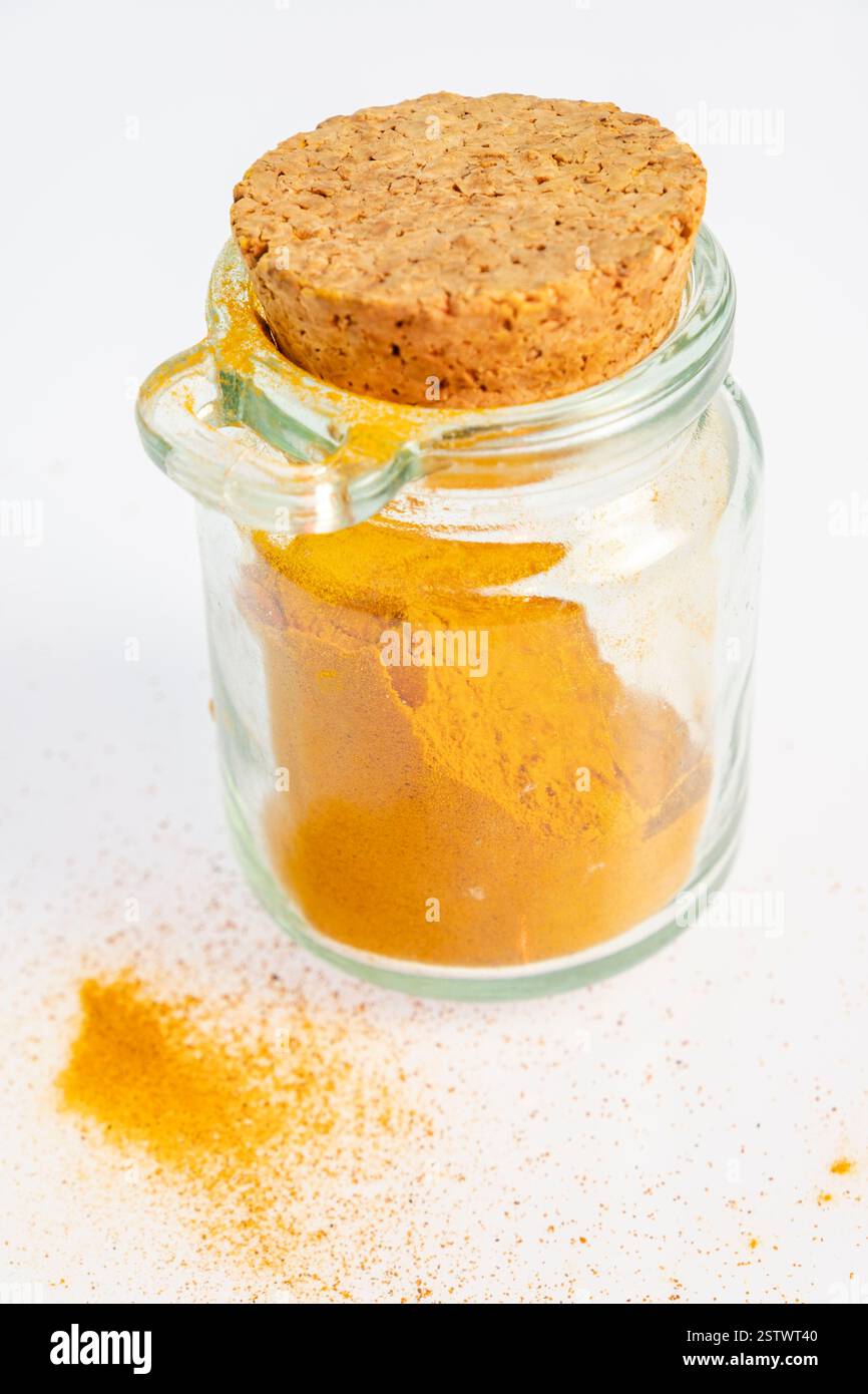 Ground turmeric in a glass jar hi-res stock photography and images - Alamy
