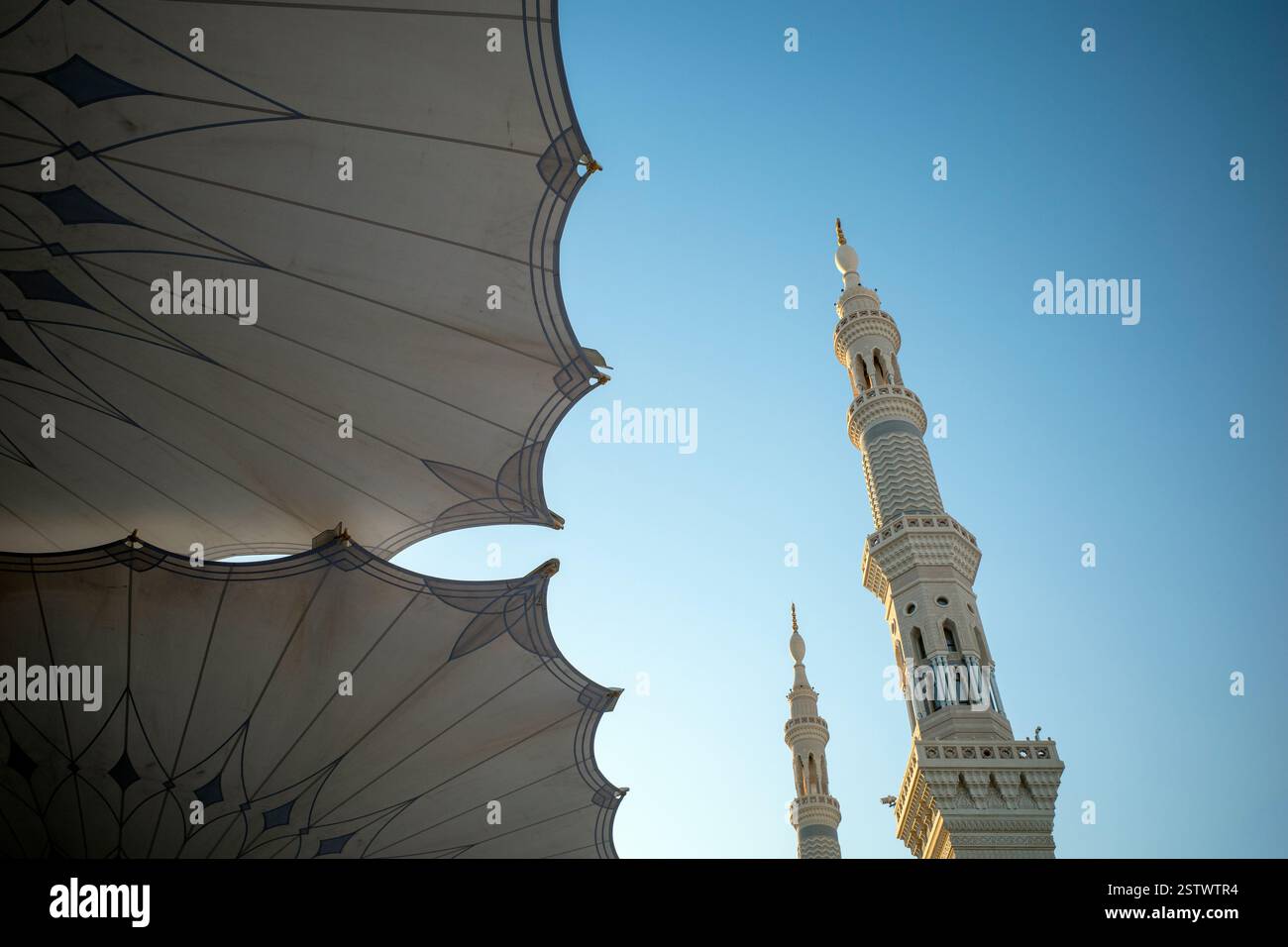 The giant automatic Umbrellas and minarets in Prophet Mosque in Madinah ...