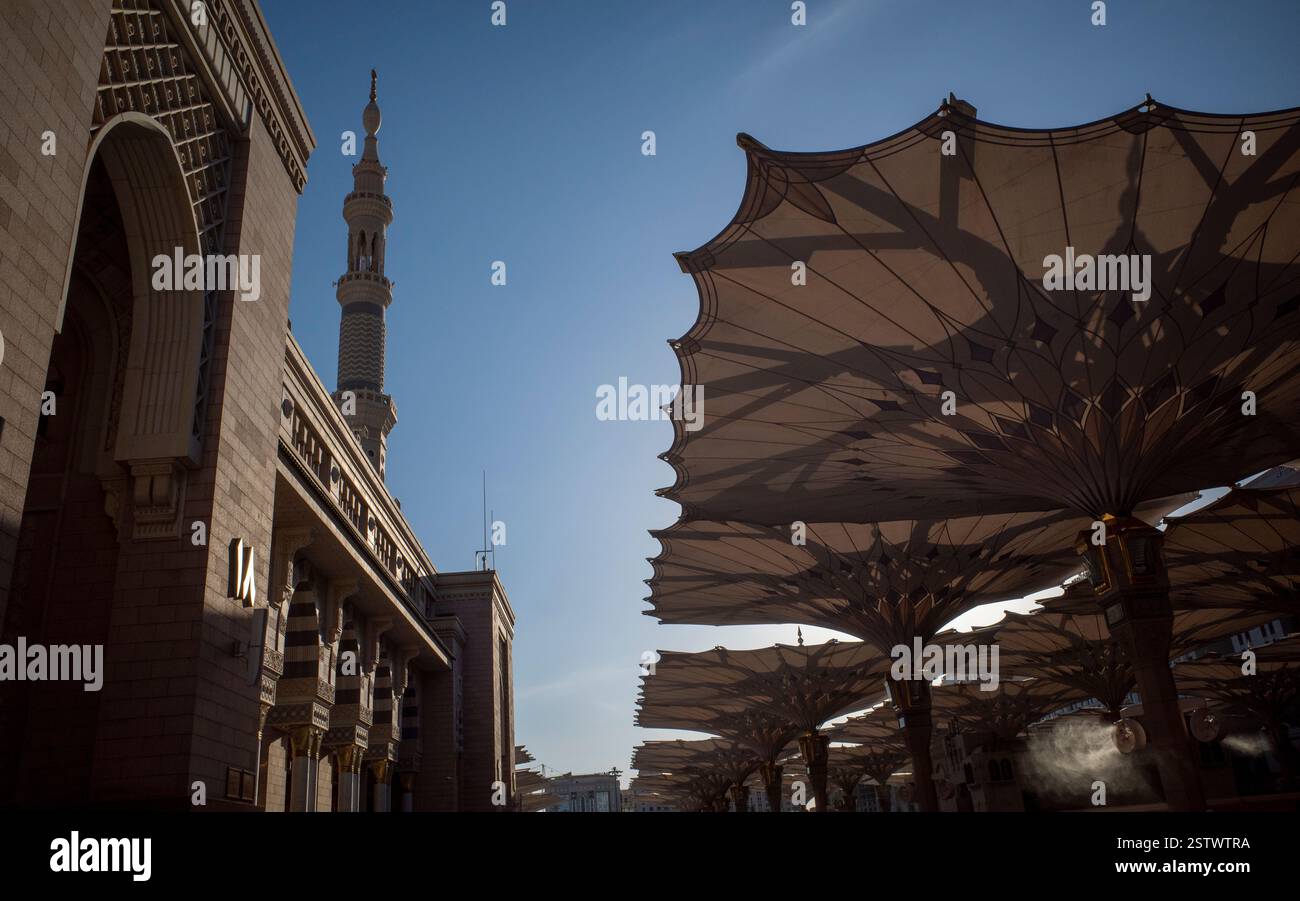 The giant automatic Umbrellas and minarets in Prophet Mosque in Madinah ...