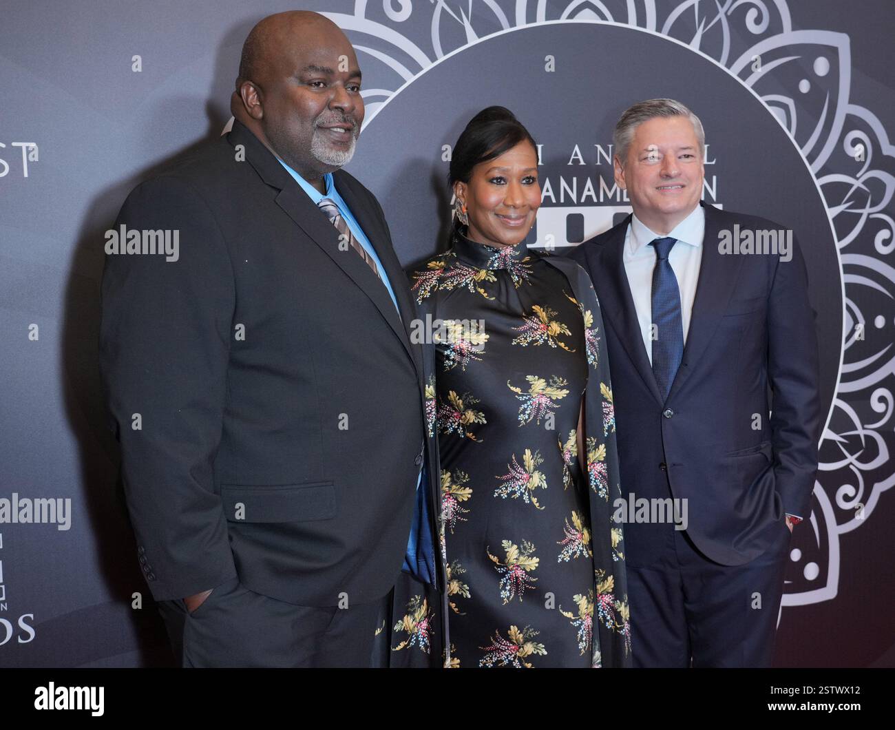 Los Angeles, USA. 19th Feb, 2025. (L-R) Gil Robertson, Nicole Avant and Ted Sarandos, Co-CEO ...