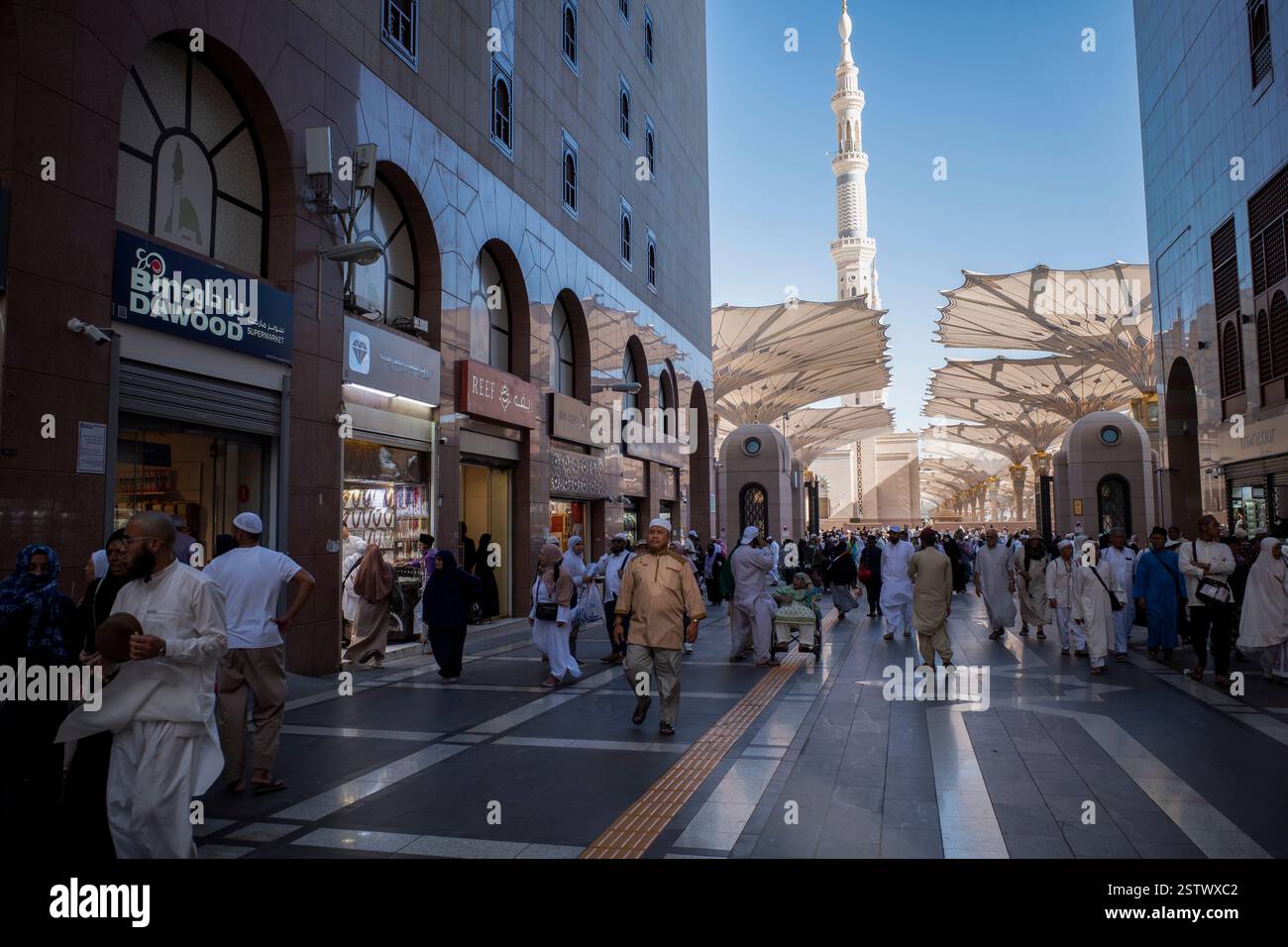 Medina, Saudi Arabia - July 2, 2024: Hajj and Umrah pilgrims walking in ...
