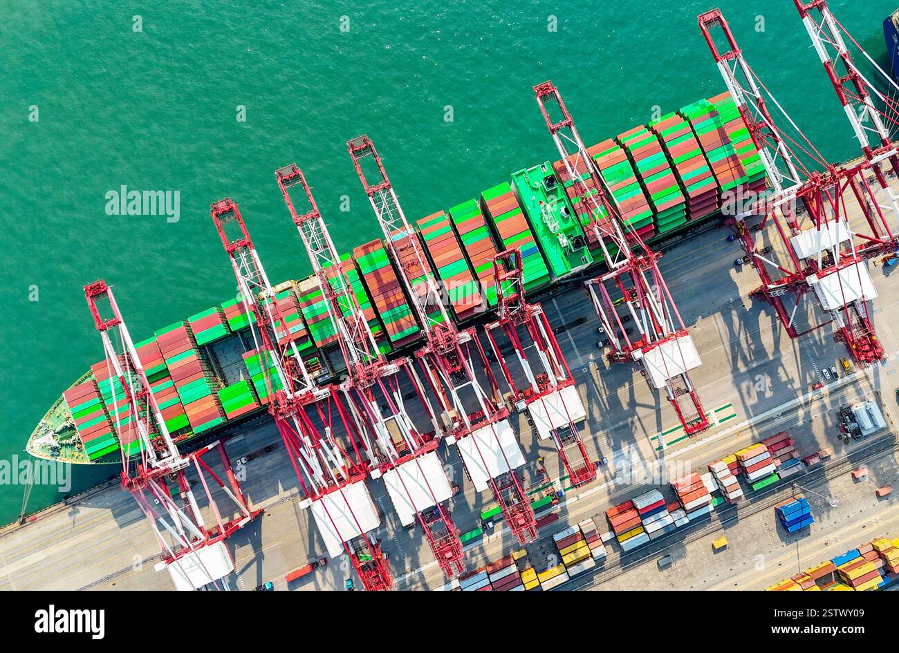 QINGDAO, CHINA - FEBRUARY 20, 2025 - A cargo ship loading and unloading ...