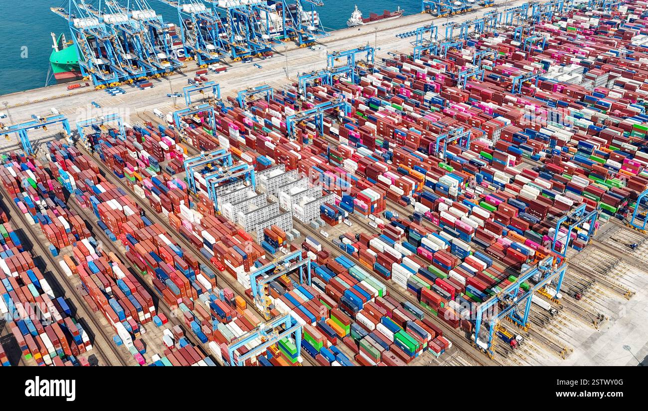 QINGDAO, CHINA - FEBRUARY 20, 2025 - High-speed rail cranes lift cargo ...