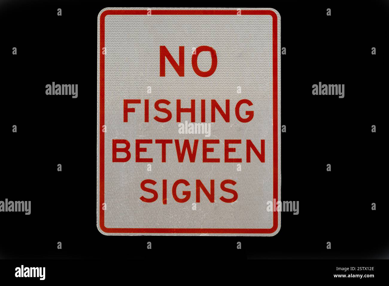 No fishing between signs hi-res stock photography and images - Alamy