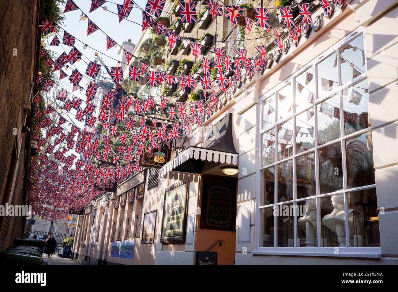 Union Jacks flags hang above the Trafalgar Tavern pub on Crane Street ...