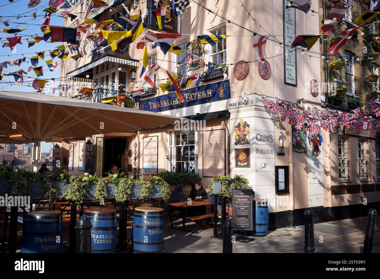 Naval nautical flags hang outside the Trafalgar Tavern pub in Greenwich ...