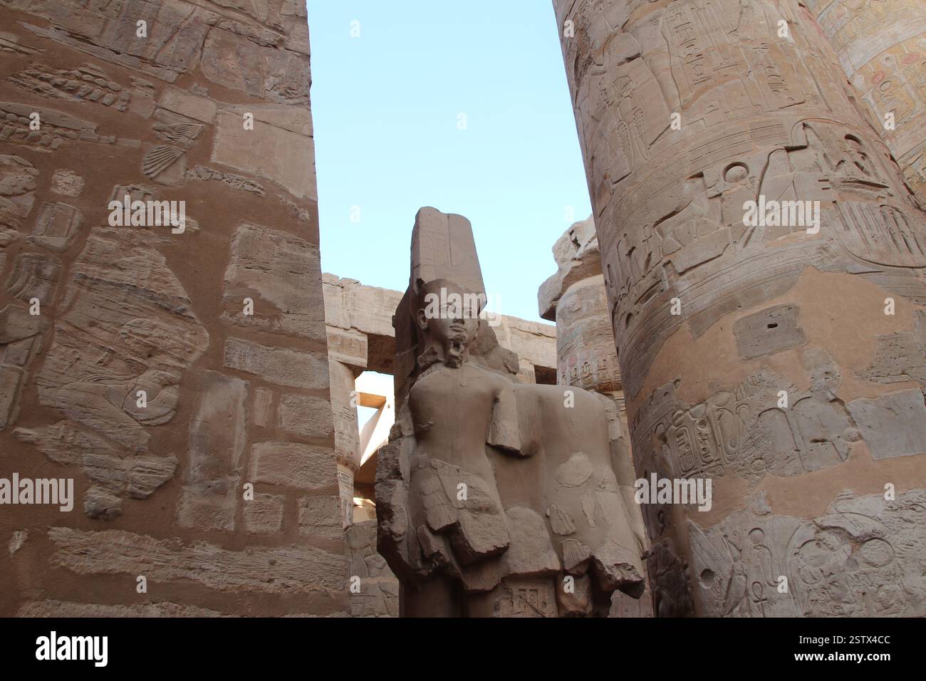 Statue of the Deity Amun Ra in the Great Hypostyle Hall at the Karnak ...