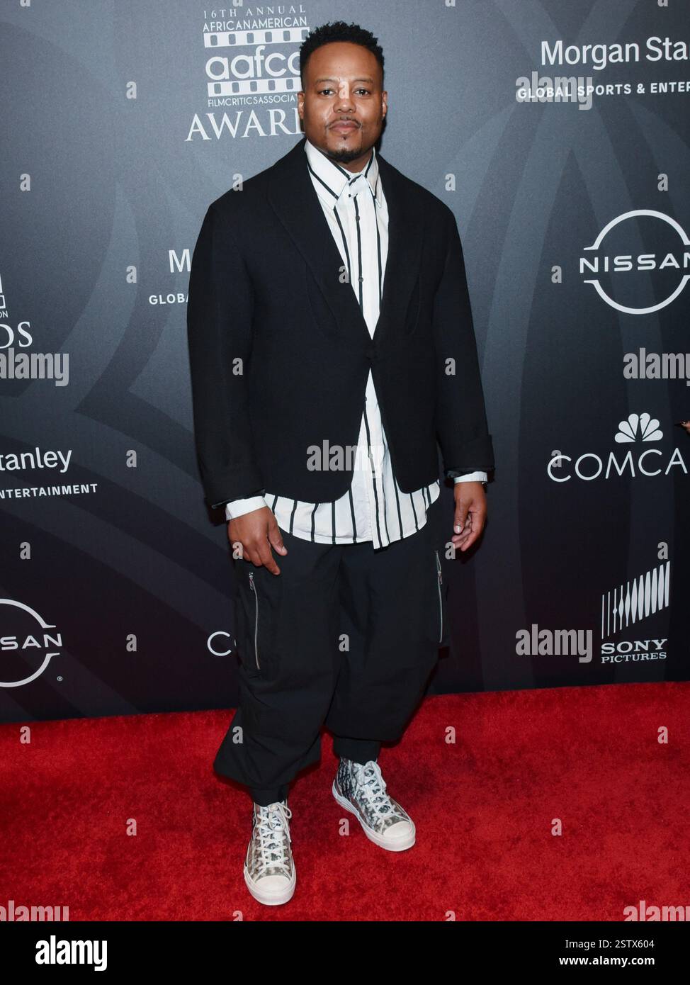 February 19, 2025, Beverly Hills, California, USA: Titus Kaphar attends ...