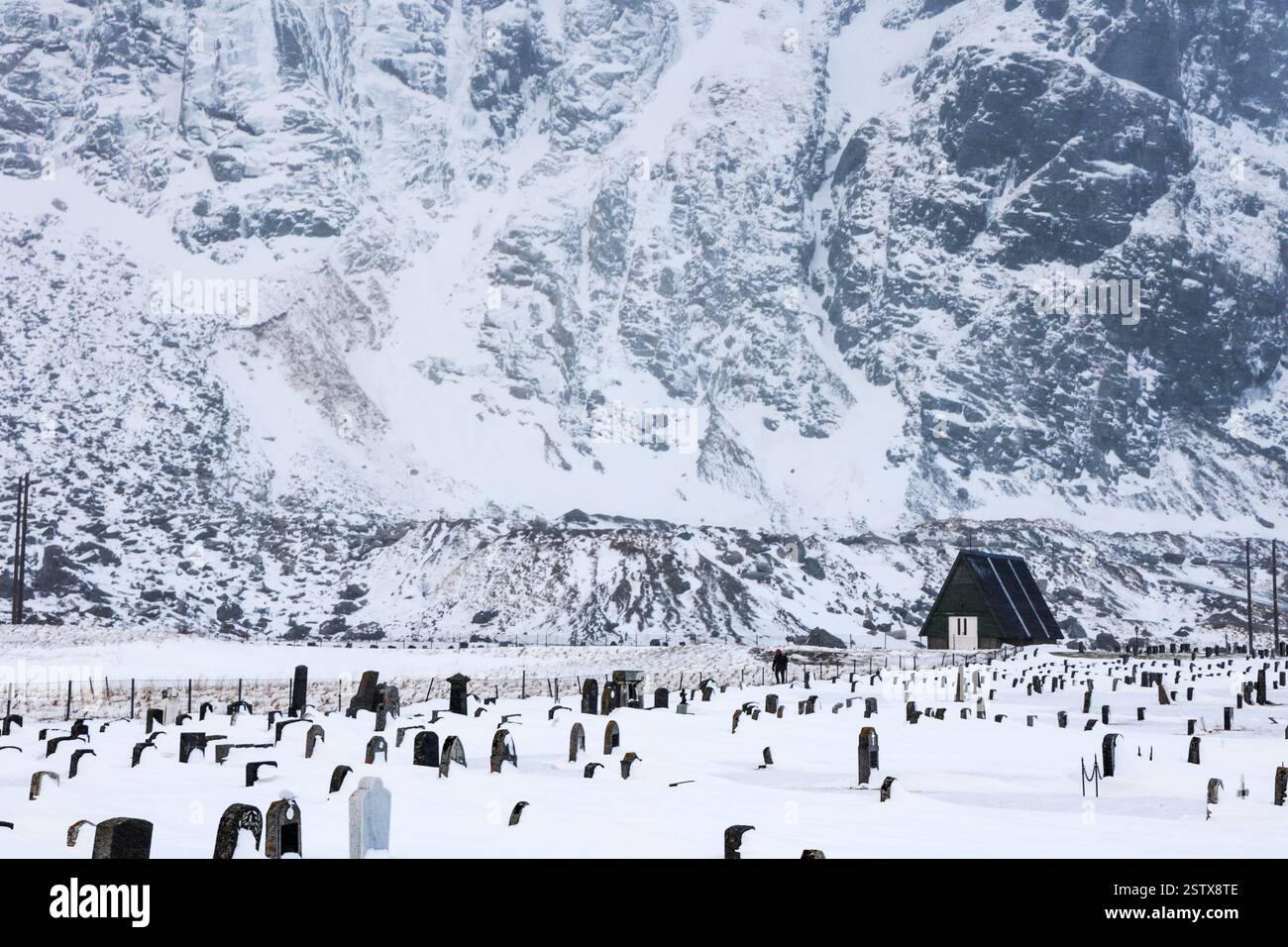 The old cemetery of Flakstad village and the small chapel in winter ...