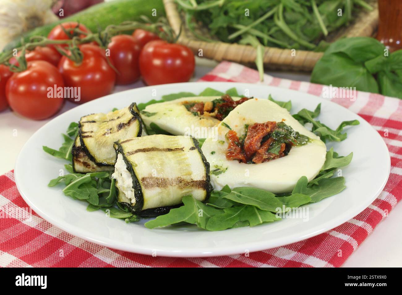 Courgette rolls and stuffed mozzarella Stock Photo - Alamy