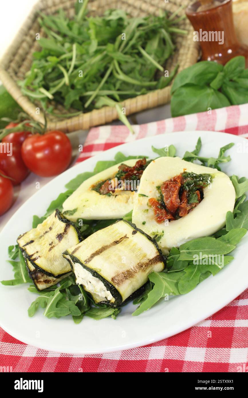 Courgette rolls and stuffed mozzarella Stock Photo - Alamy
