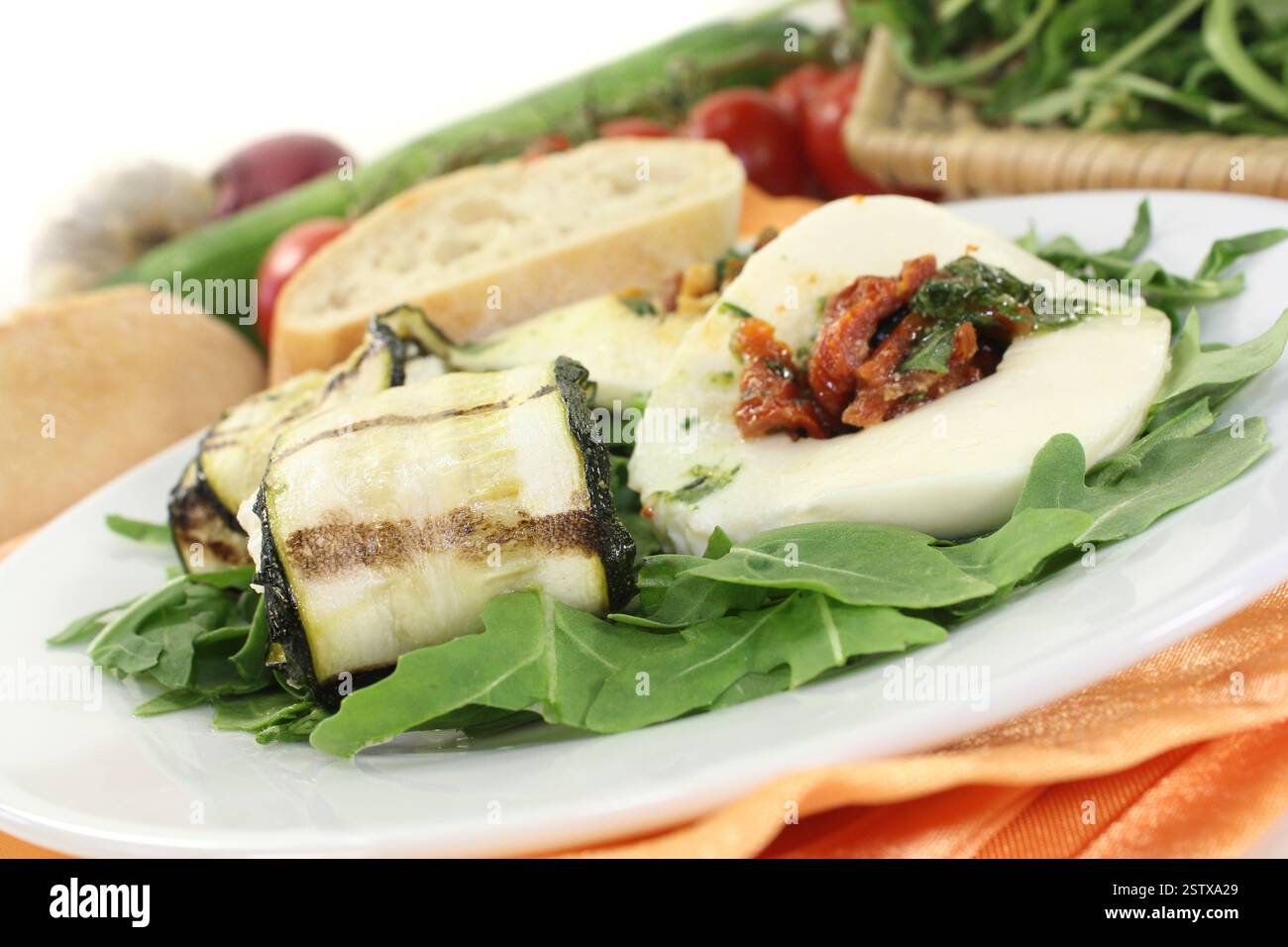 Courgette rolls and stuffed mozzarella Stock Photo - Alamy