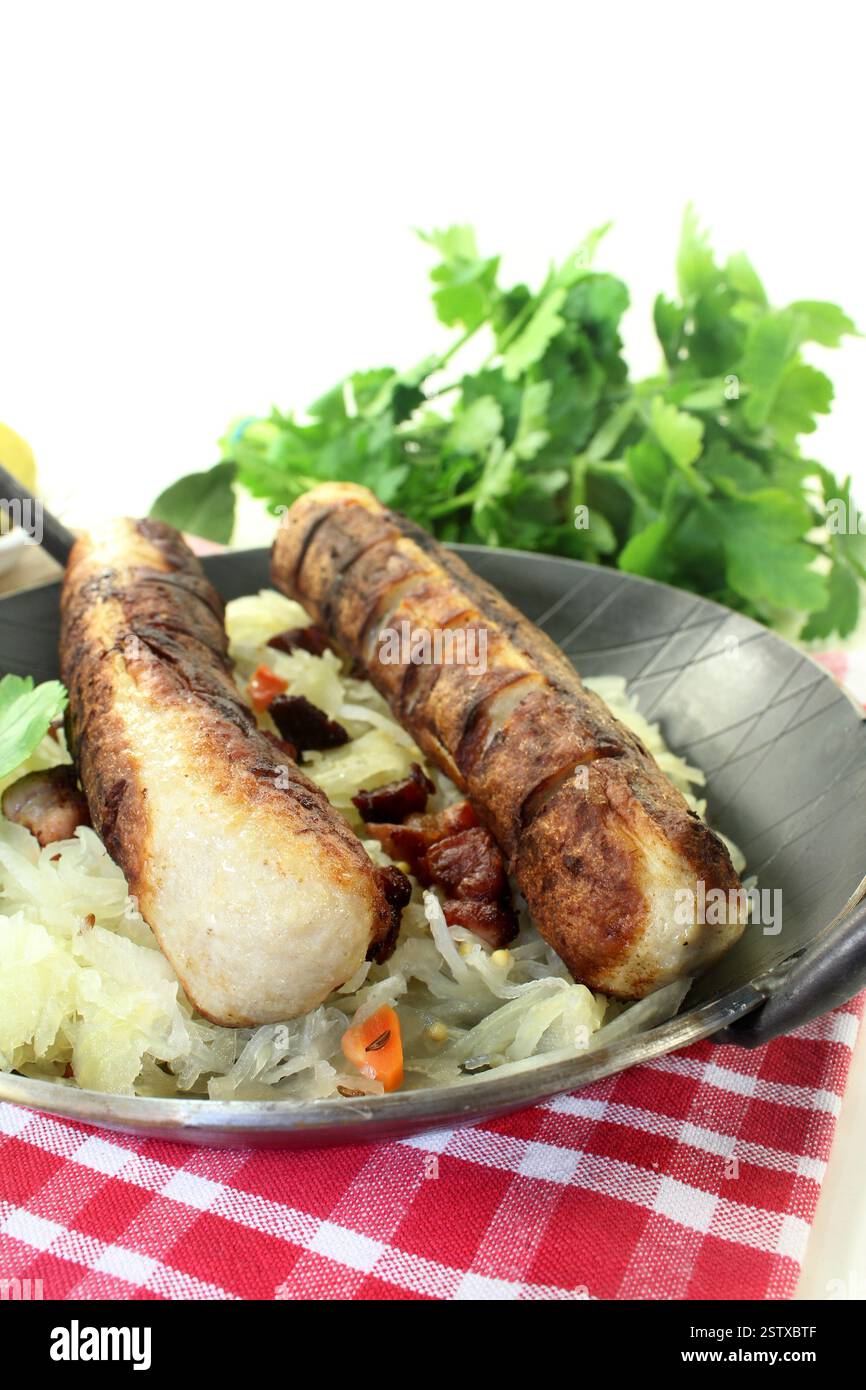 Fried sausage with Sauerkraut Stock Photo - Alamy
