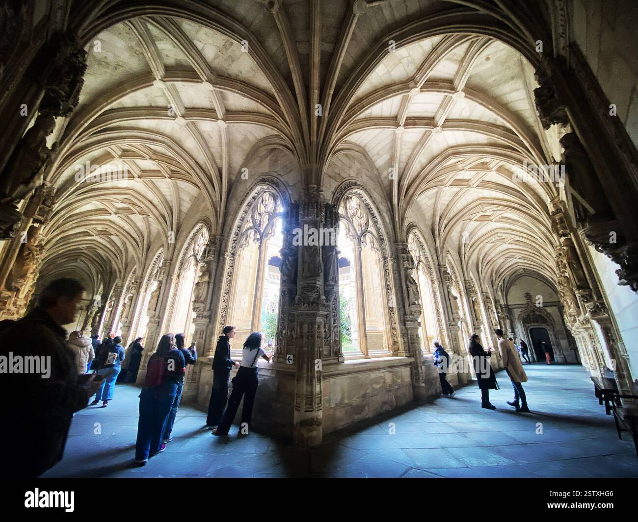 People visit the San Juan de los Reyes monastery in the Spanish ...