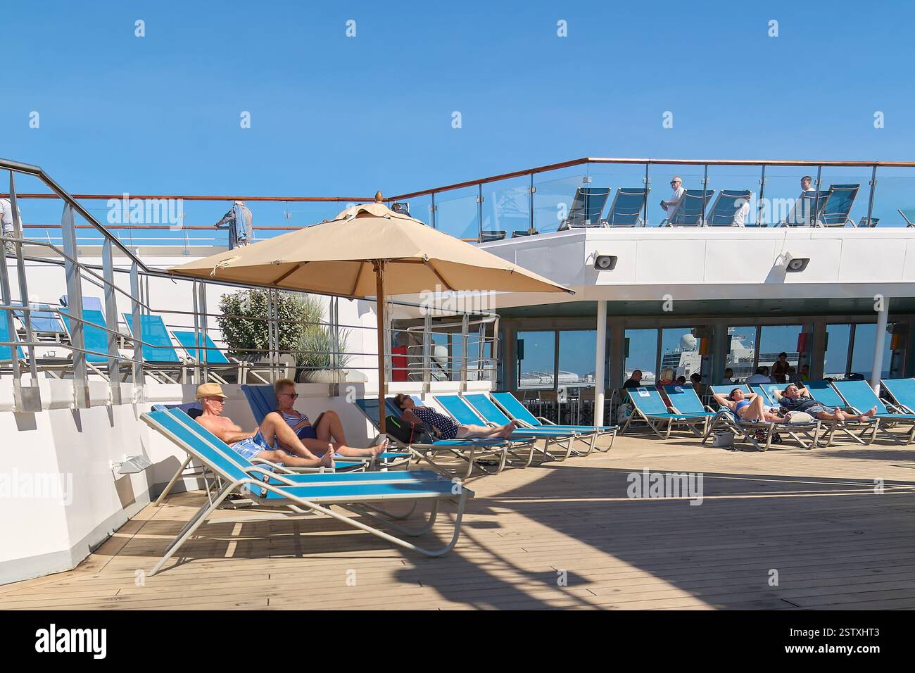Catania. Italy - February 20, 2025: Enjoying a sunny day by the pool on ...