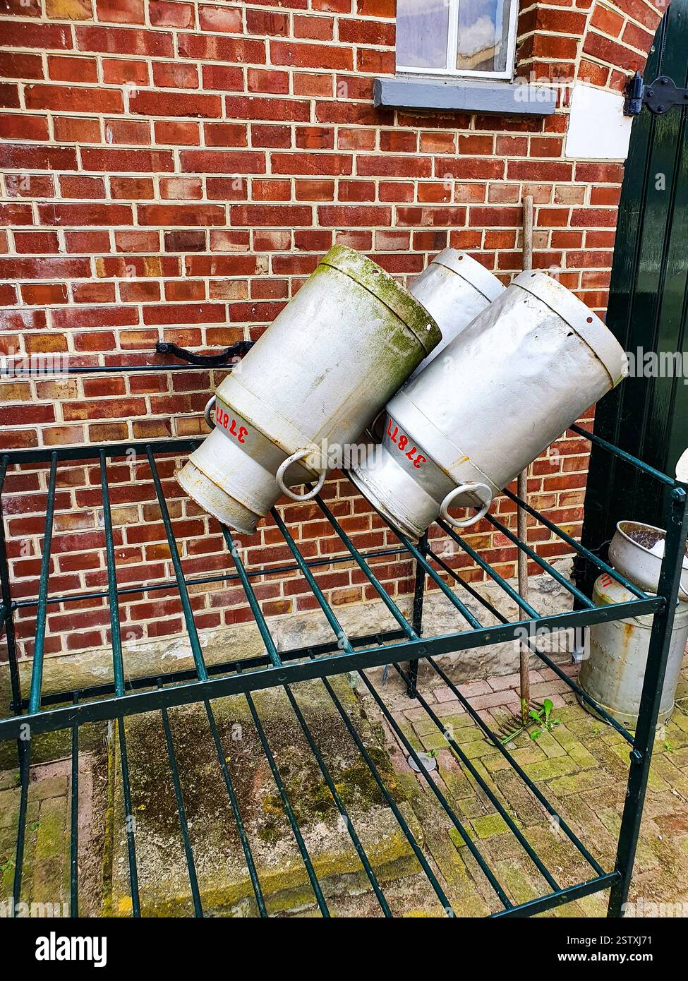 Milk cans on a farm in the Netherlands Stock Photo - Alamy