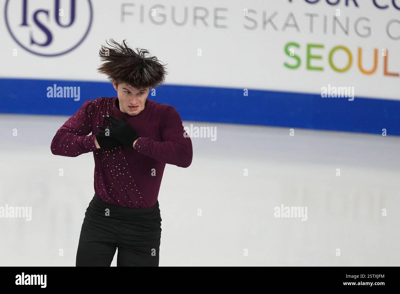 Douglas Gerber of Australia performs during the men's short program in ...