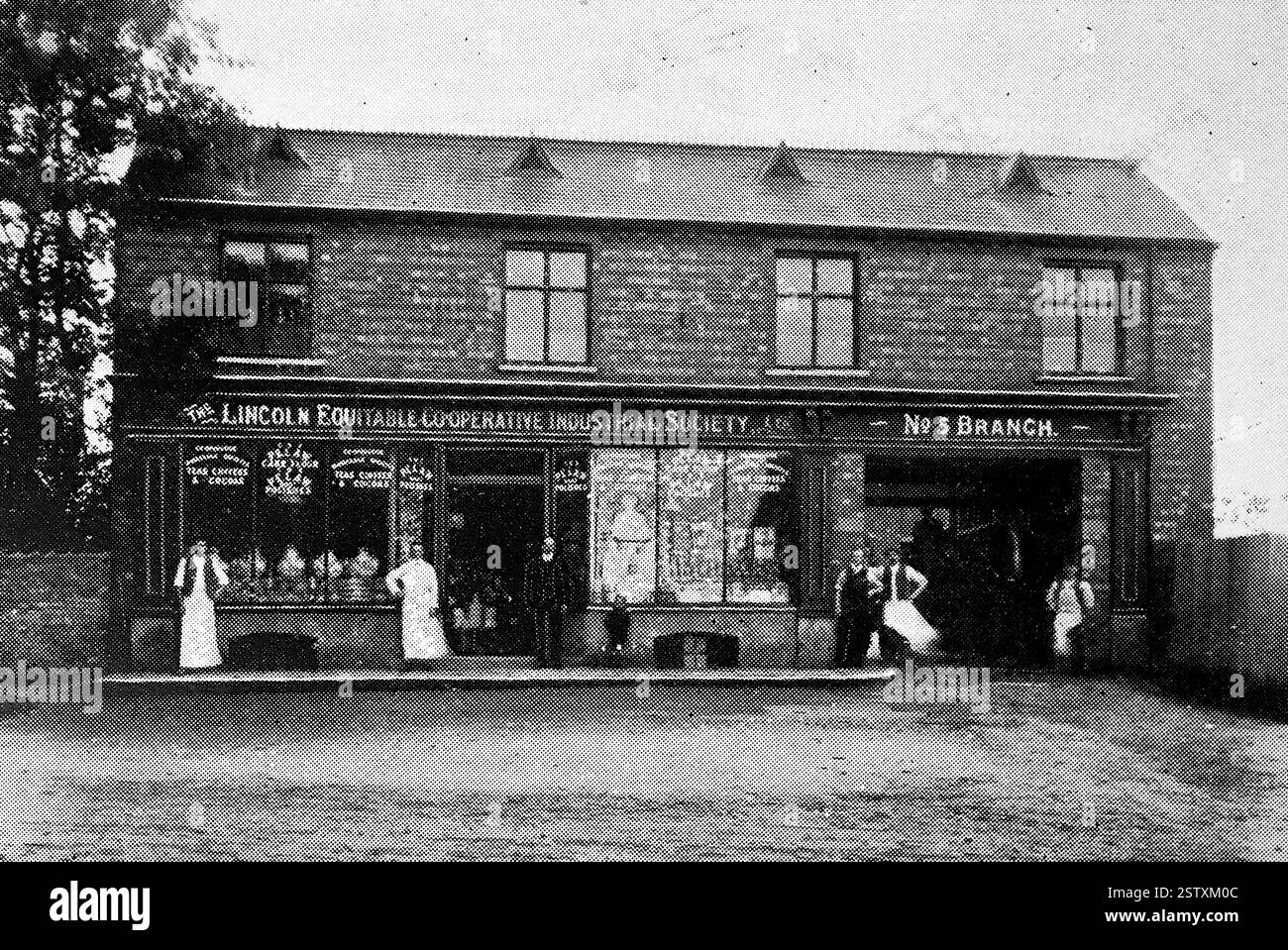 Shopfront and staff members of the No. 5 Branch, in Welbourn, Lincoln ...