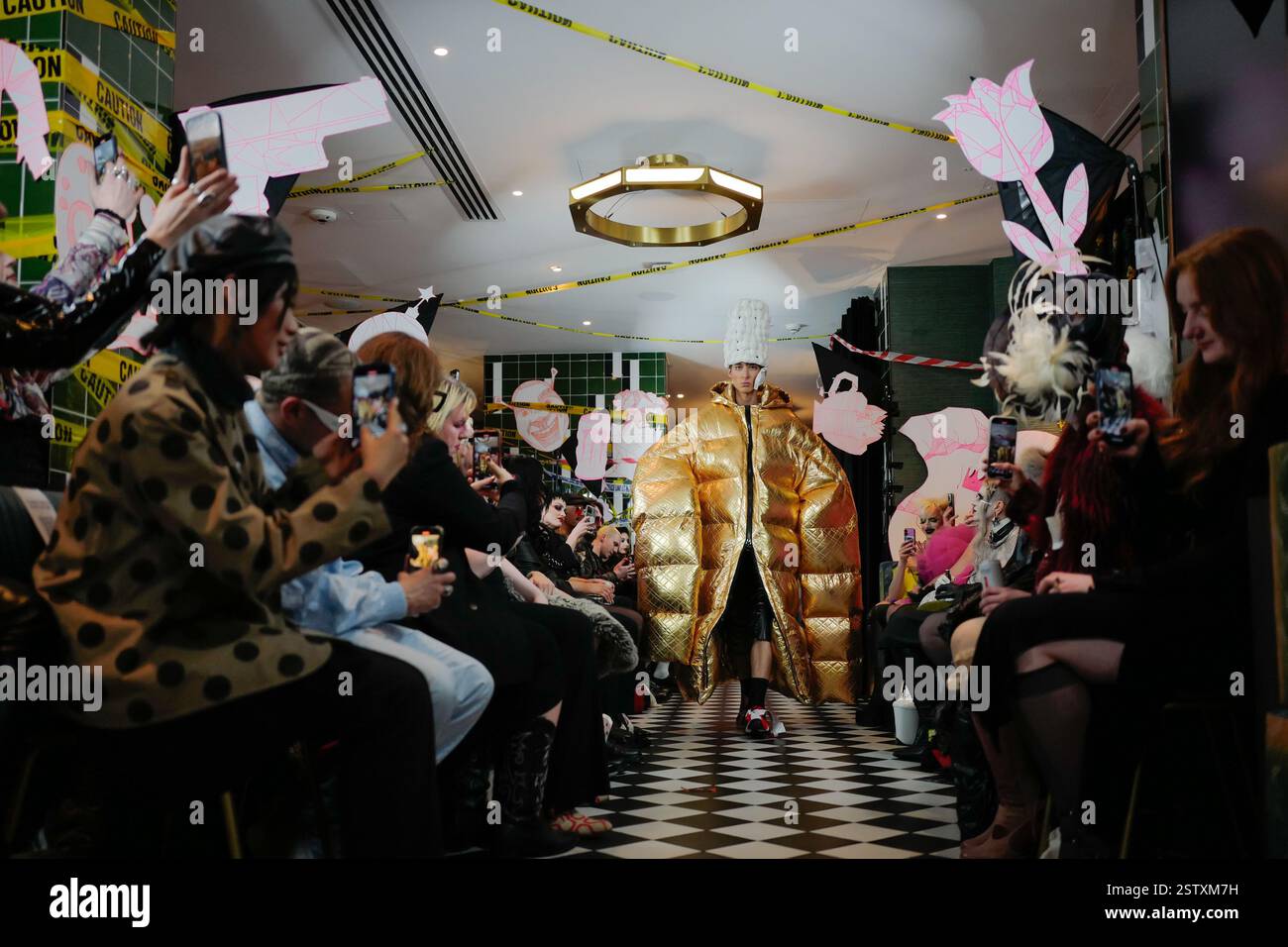 A model walks the runway at the Vin & Omi show during London Fashion ...