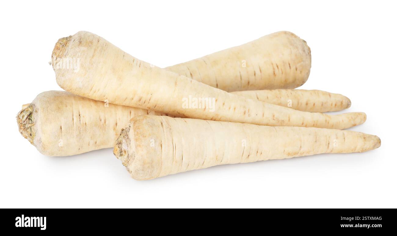 Many raw parsley roots isolated on white Stock Photo - Alamy