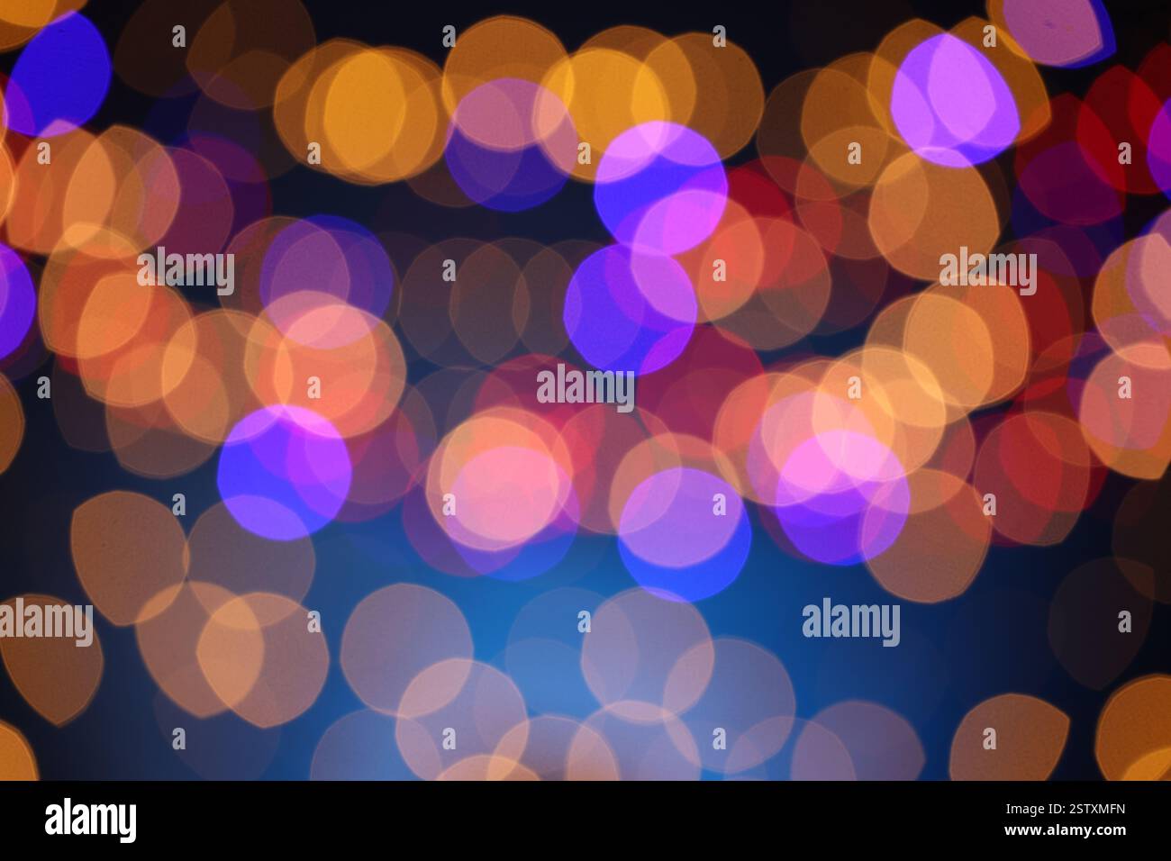 Blurred view of colorful lights on dark blue background, bokeh effect Stock Photo - Alamy