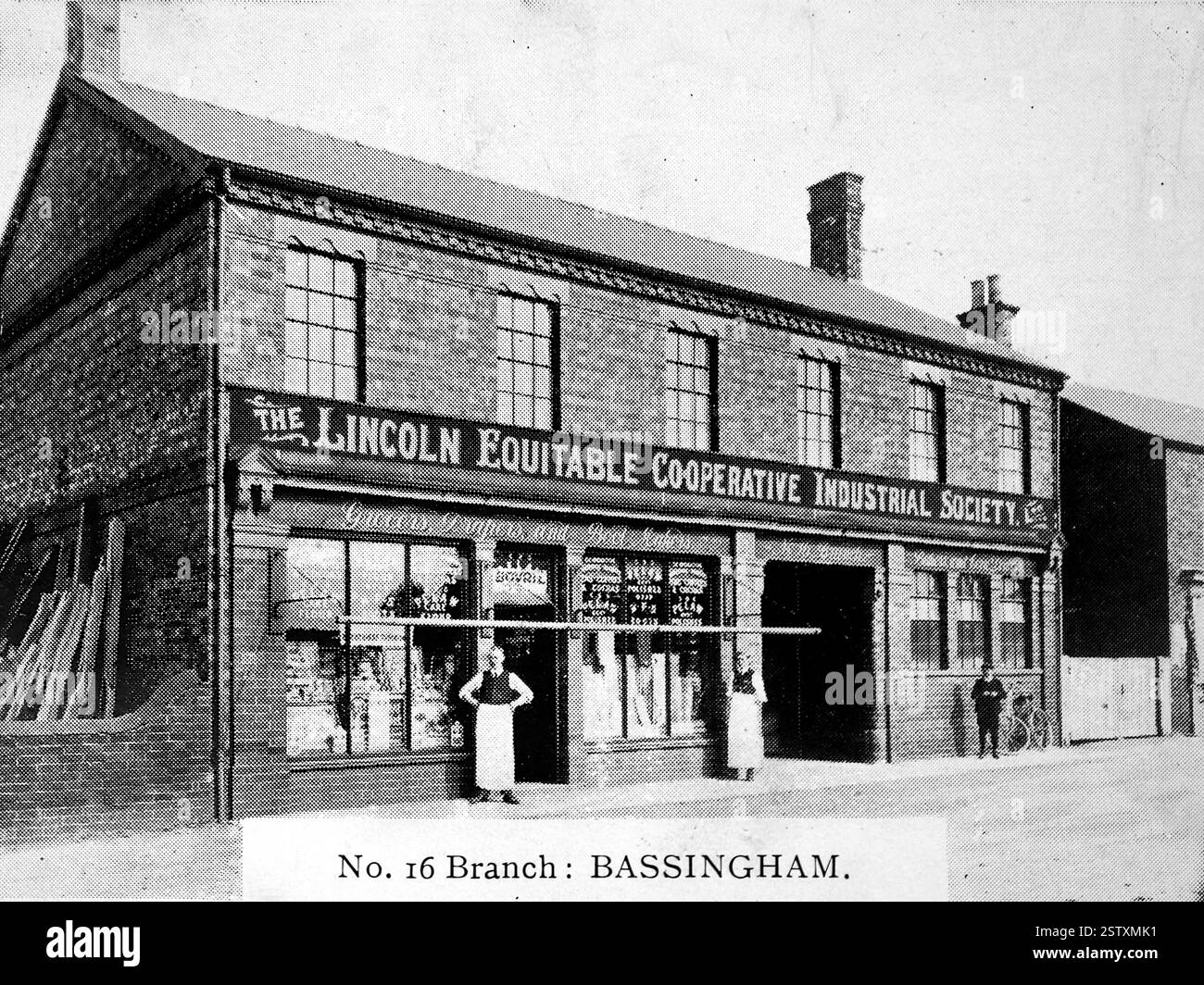 Shopfront and staff members of the No. 16 Branch, Bassingham, Lincoln ...