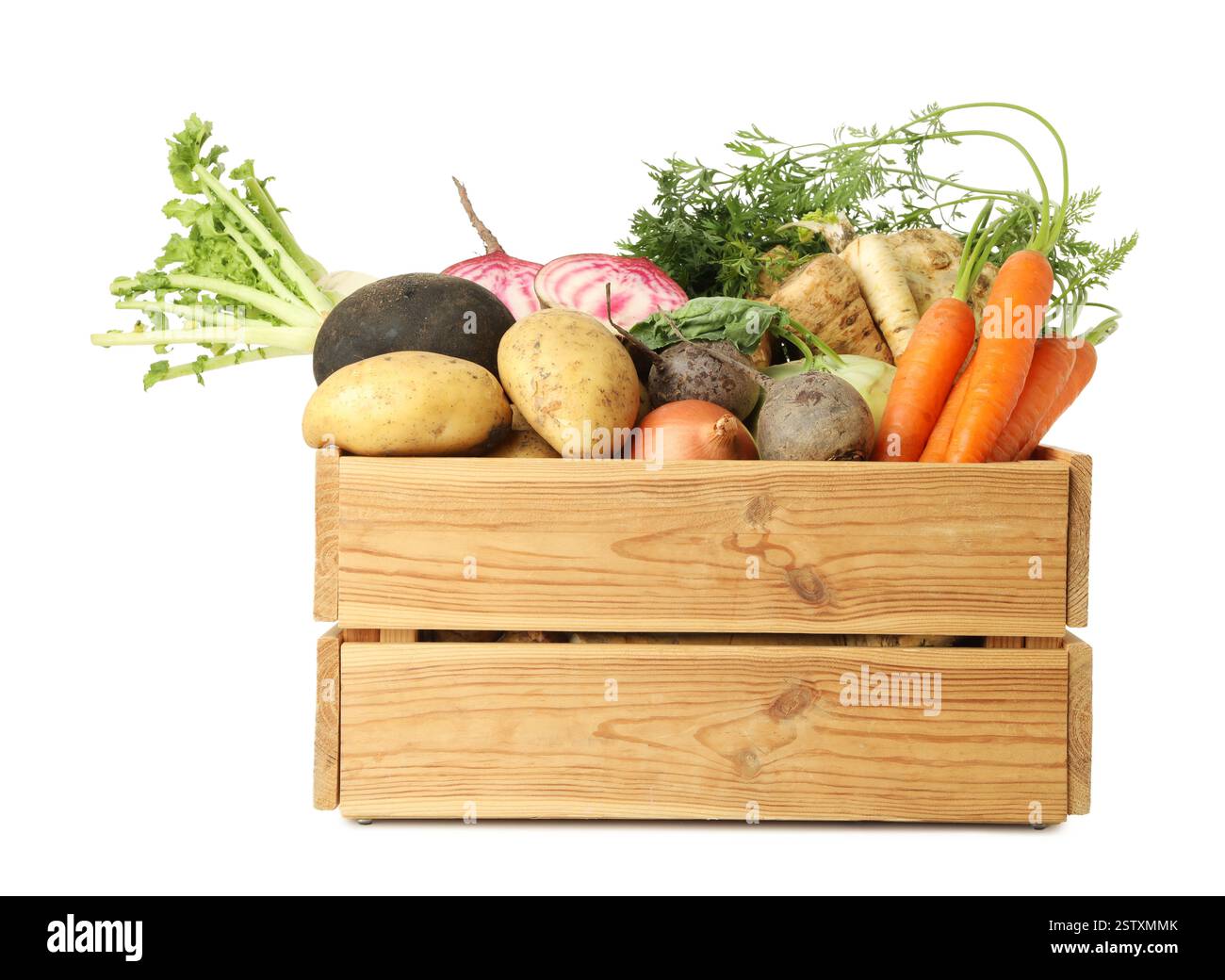 Different root vegetables in wooden crate isolated on white Stock Photo ...