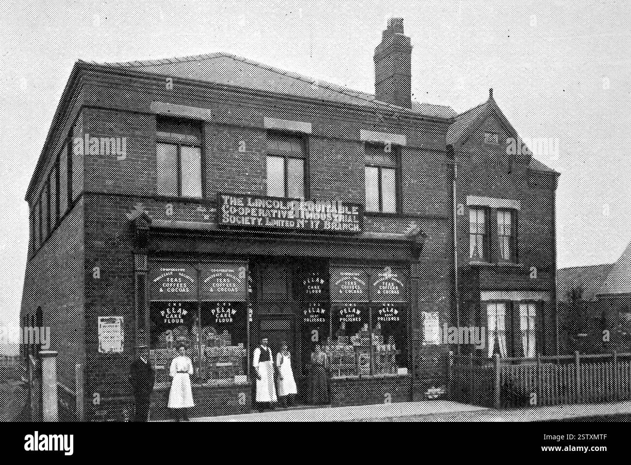Shopfront and staff members of the No. 17 Branch, Reepham, Lincoln ...