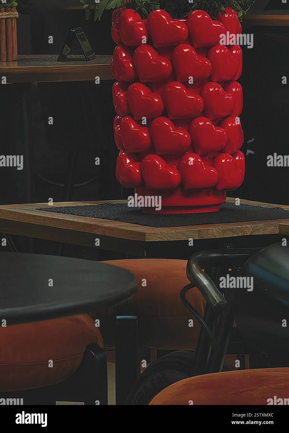 Heartfelt Design: Modern Vase in a Cozy Coffee Bar Stock Photo - Alamy