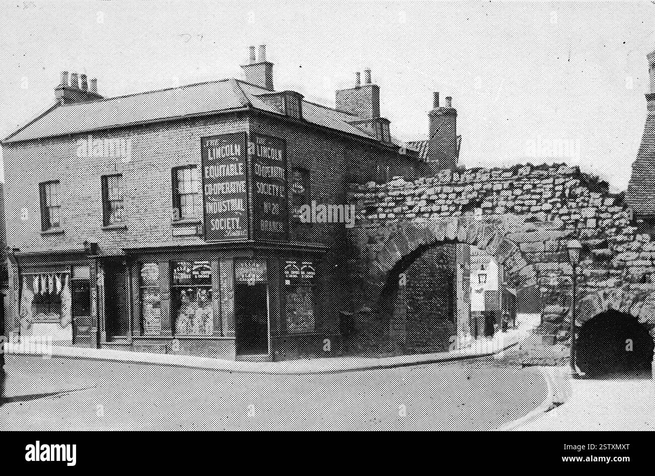 Shopfront of the No. 20 Branch, Newport, alongside the old Roman arch ...