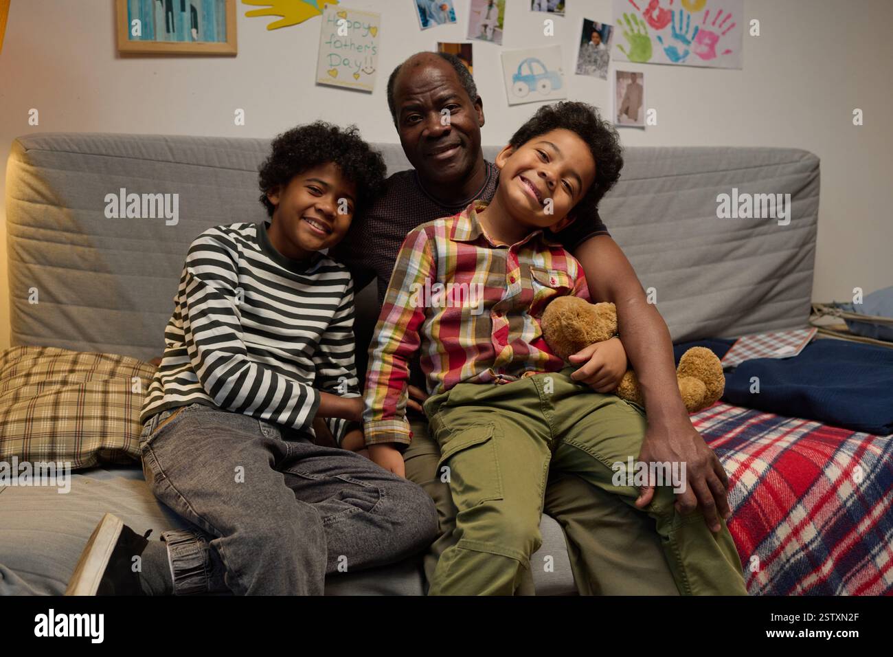 African american family sharing bed hi-res stock photography and images ...