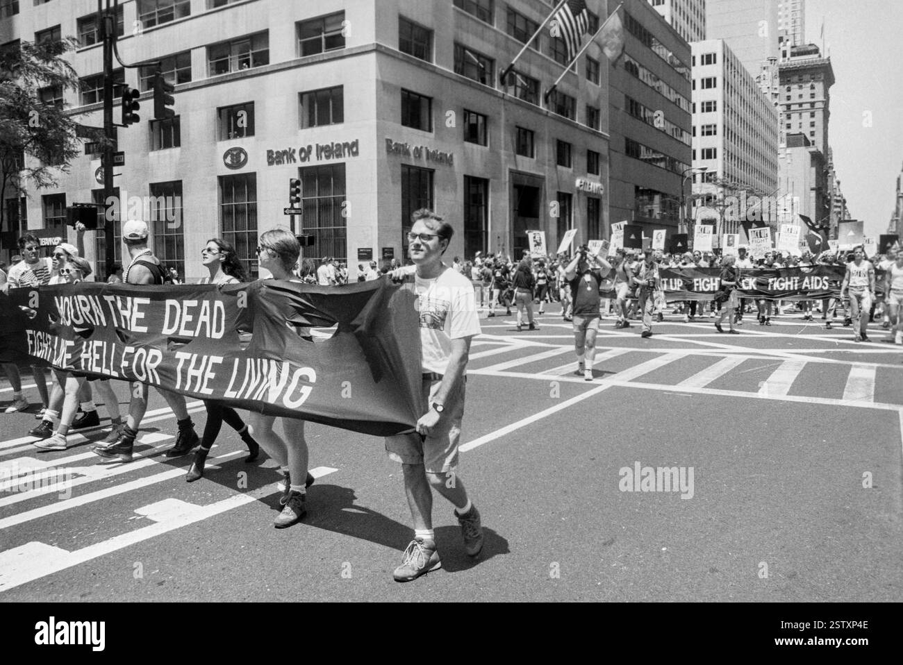 marchers presenting banner mourn the dead, fight like hell for the ...