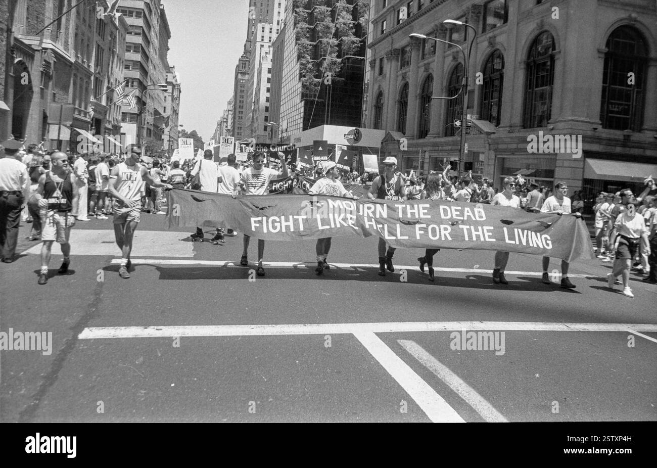 marchers presenting banner mourn the dead, fight like hell for the ...