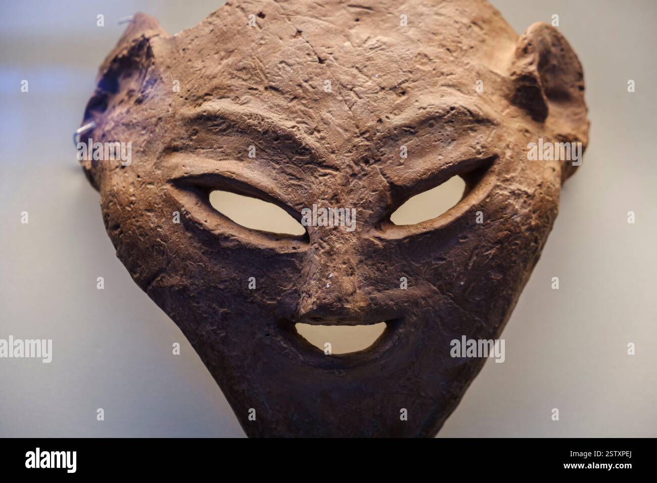 Cast of a ceramic mask Stock Photo - Alamy